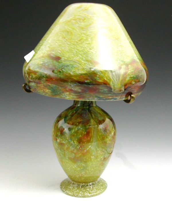 70: A Monart glass lamp, the mushroom shade above a ba