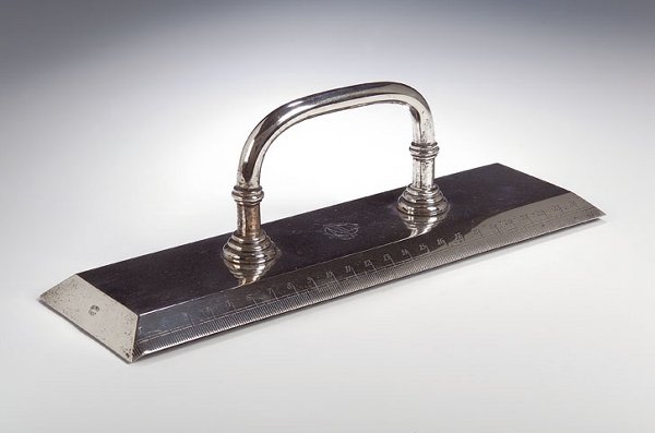 1018: A silver desk ruler, with marks for Asprey & Co,