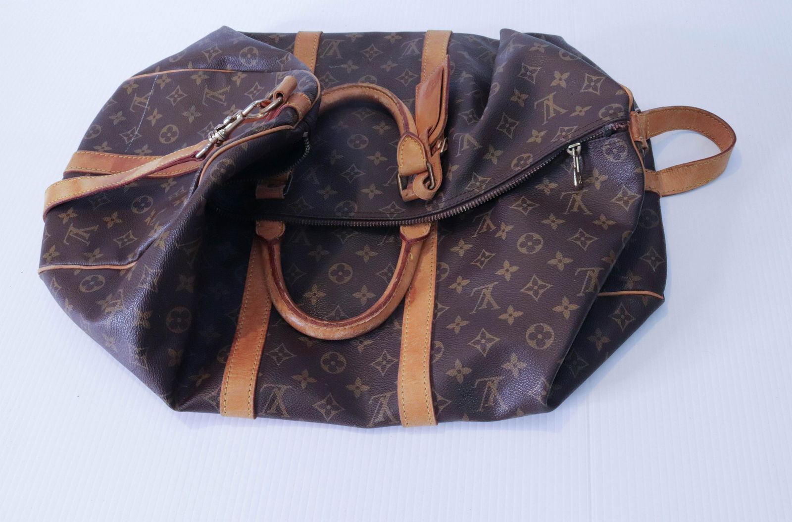 For Auction: VINTAGE LOUIS VUITTON SMALL DUFFEL BAG (#0308) on Aug 07 ...