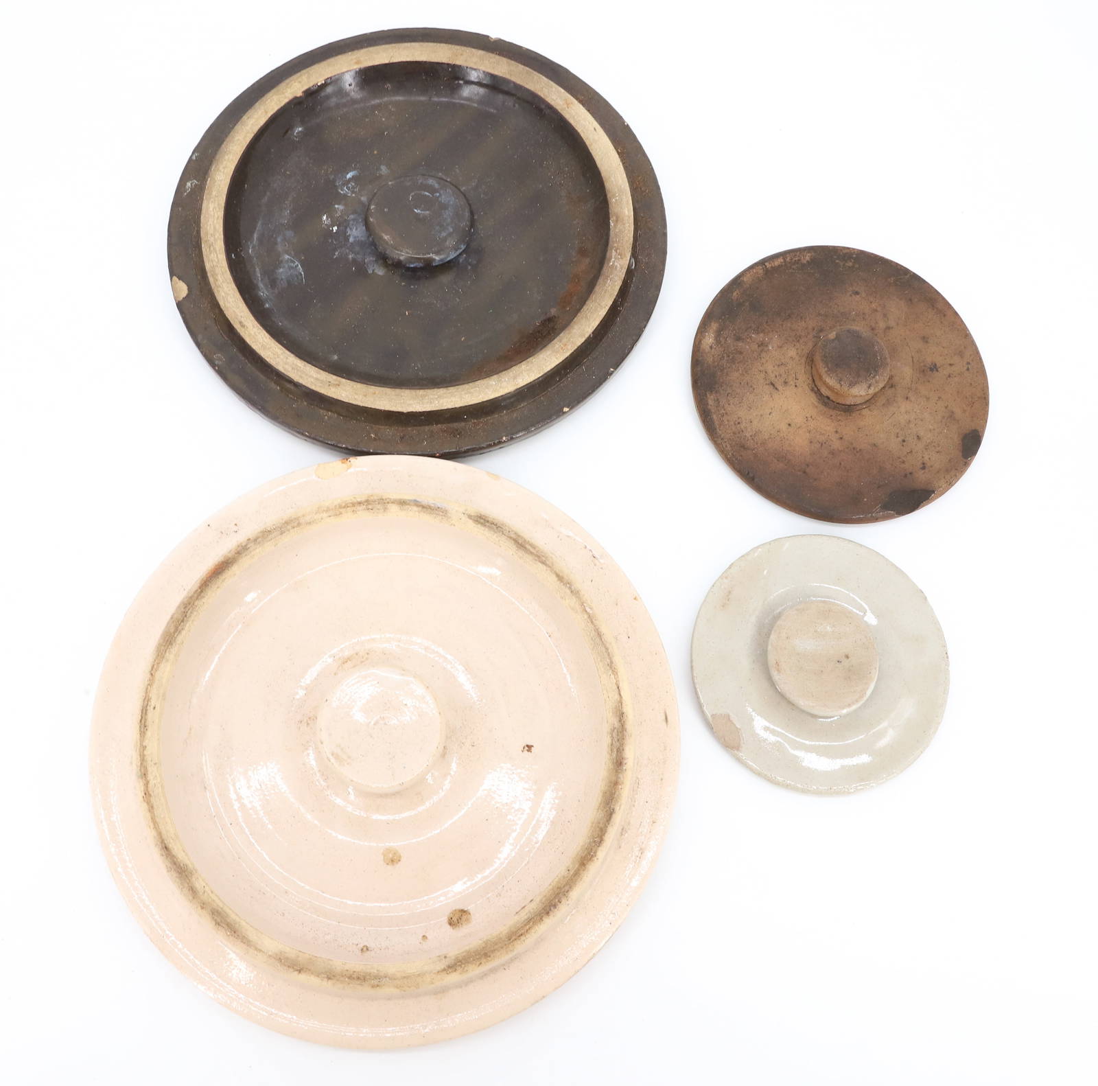 Lot Of Crock Lids Auction