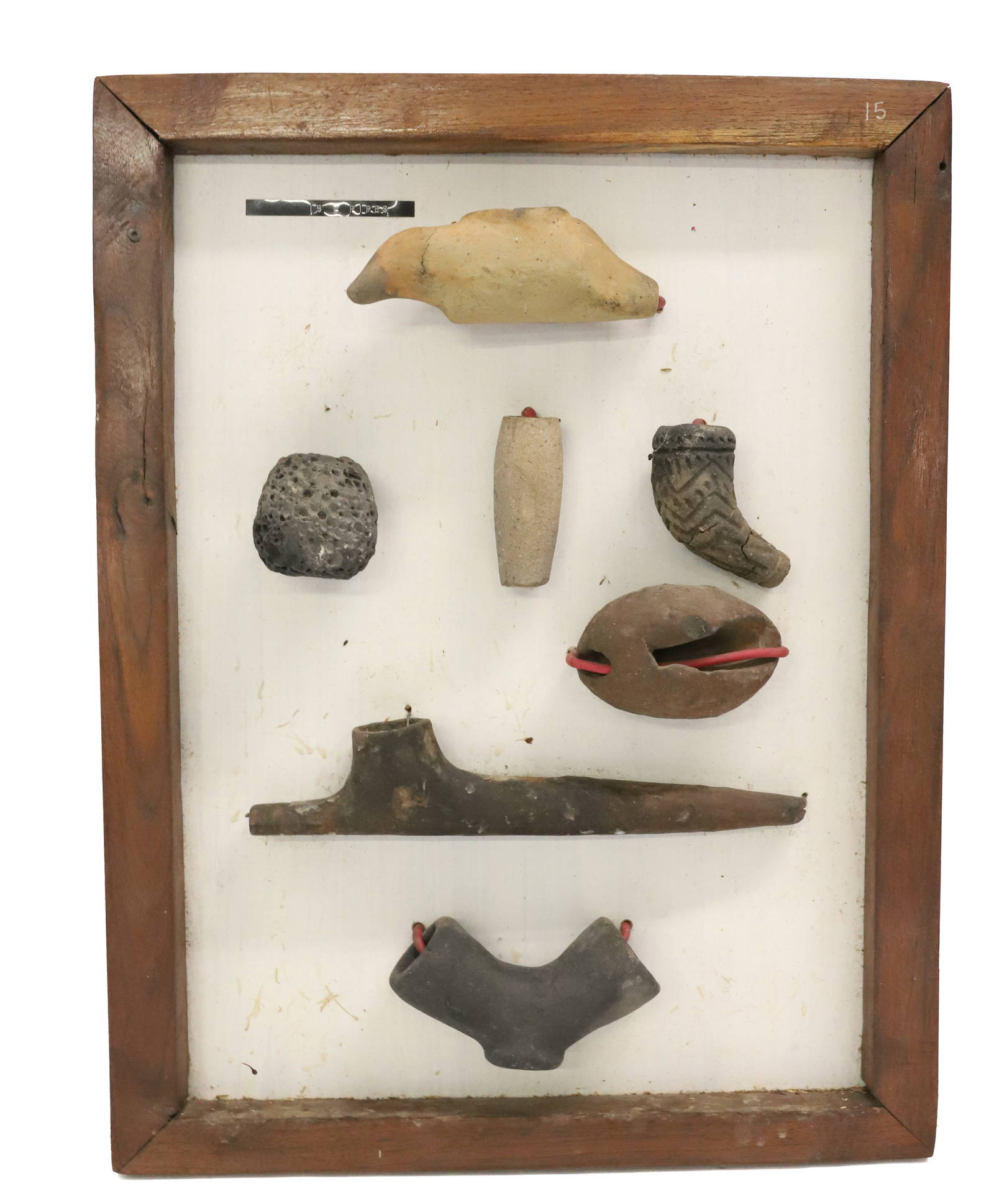 Framed Collection Of Pottery Pipes Auction