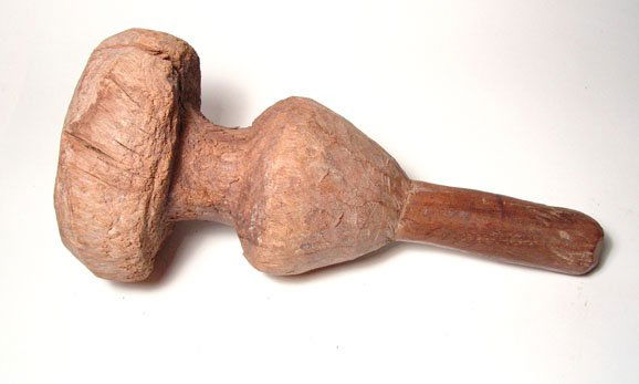 82: A large wooden stone mason's mallet.