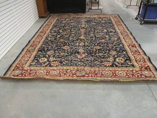 Maroon And Burgundy Floral Rug With Fringe. Auction