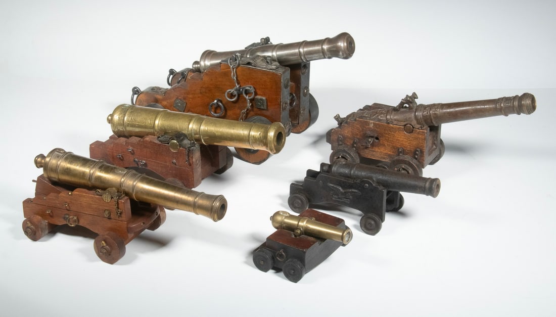 (6) Desk Cannons Auction