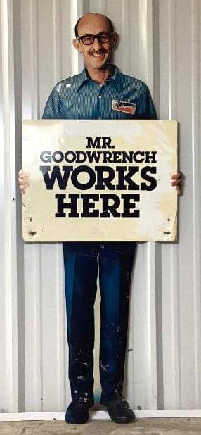 Mr. Goodrich Die-cut Metal Sign Auction