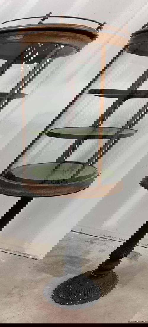 Early Oak Revolving Showcase Auction